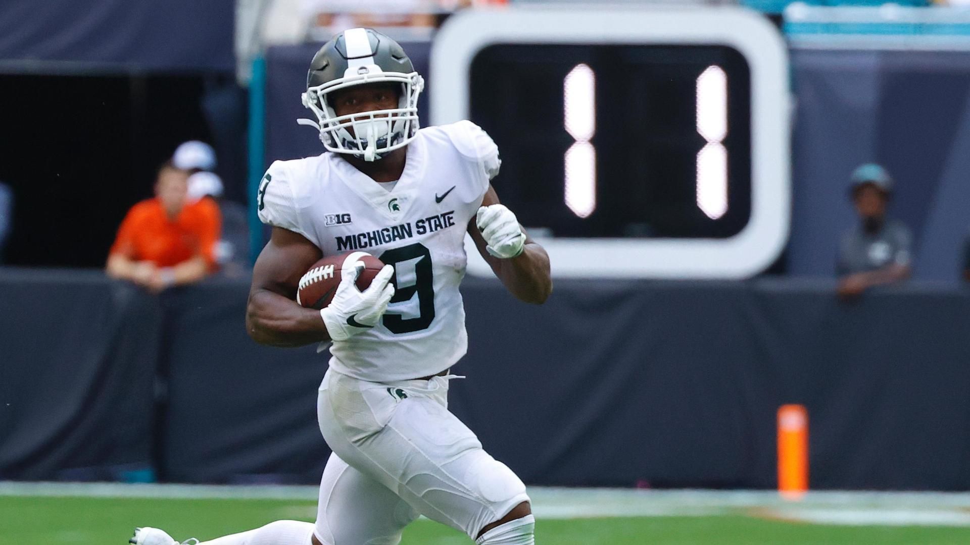 Michigan State scores three TDs in the fourth to blow out Miami - ESPN ...
