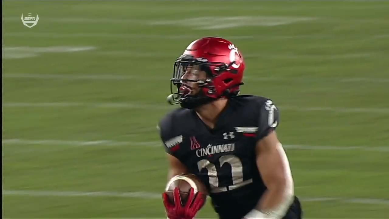 Ryan Montgomery ices game for Cincinnati with impressive TD run - ESPN ...