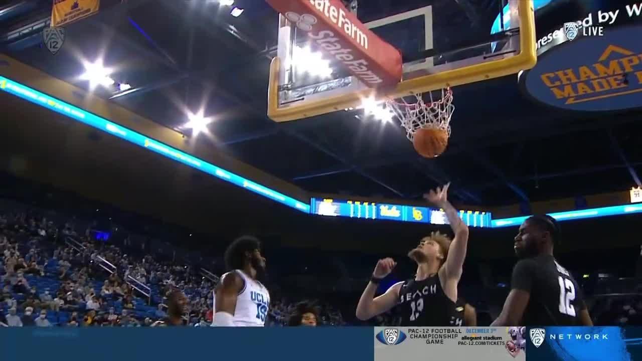 Myles Johnson gets the hoop and the harm - ESPN Video