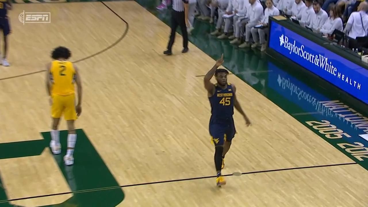 Seth Wilson closes 1st half for WVU with long buzzer-beating 3 - ESPN Video