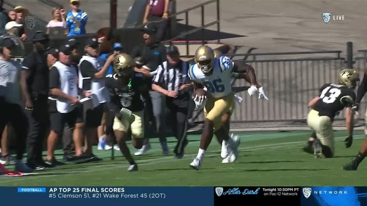 Michael Ezeike hurdles defender for first down - ESPN Video