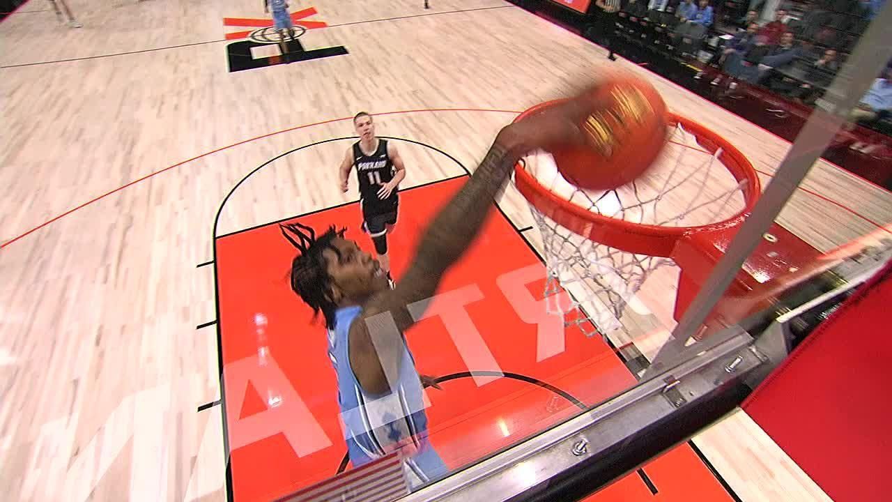 Caleb Love surpasses 1,000-point mark with his one-handed slam - ESPN Video