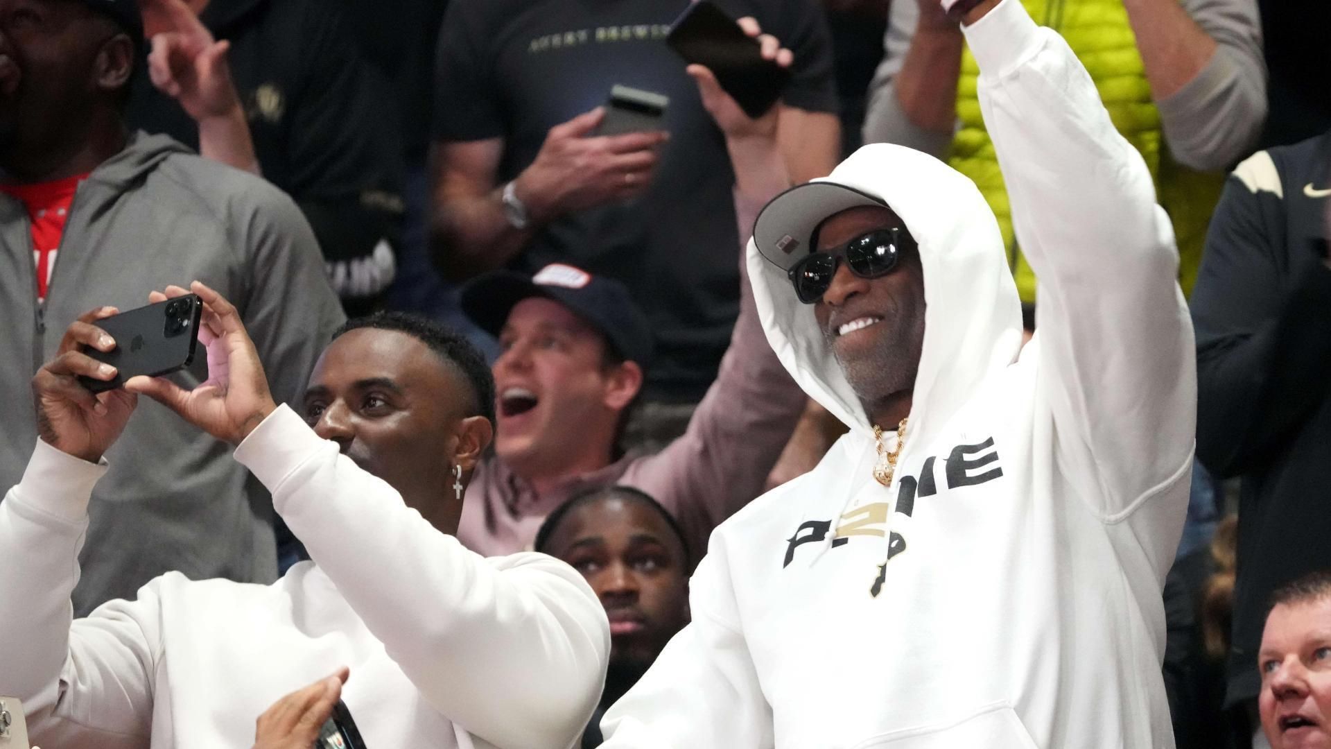Deion gets rousing ovation from fans at Colorado basketball game - ESPN ...