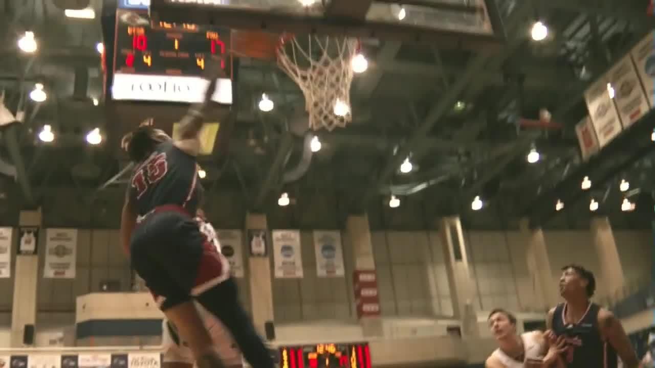 Florida Atlantic's Alijah Martin finishes the dunk over the defender ...