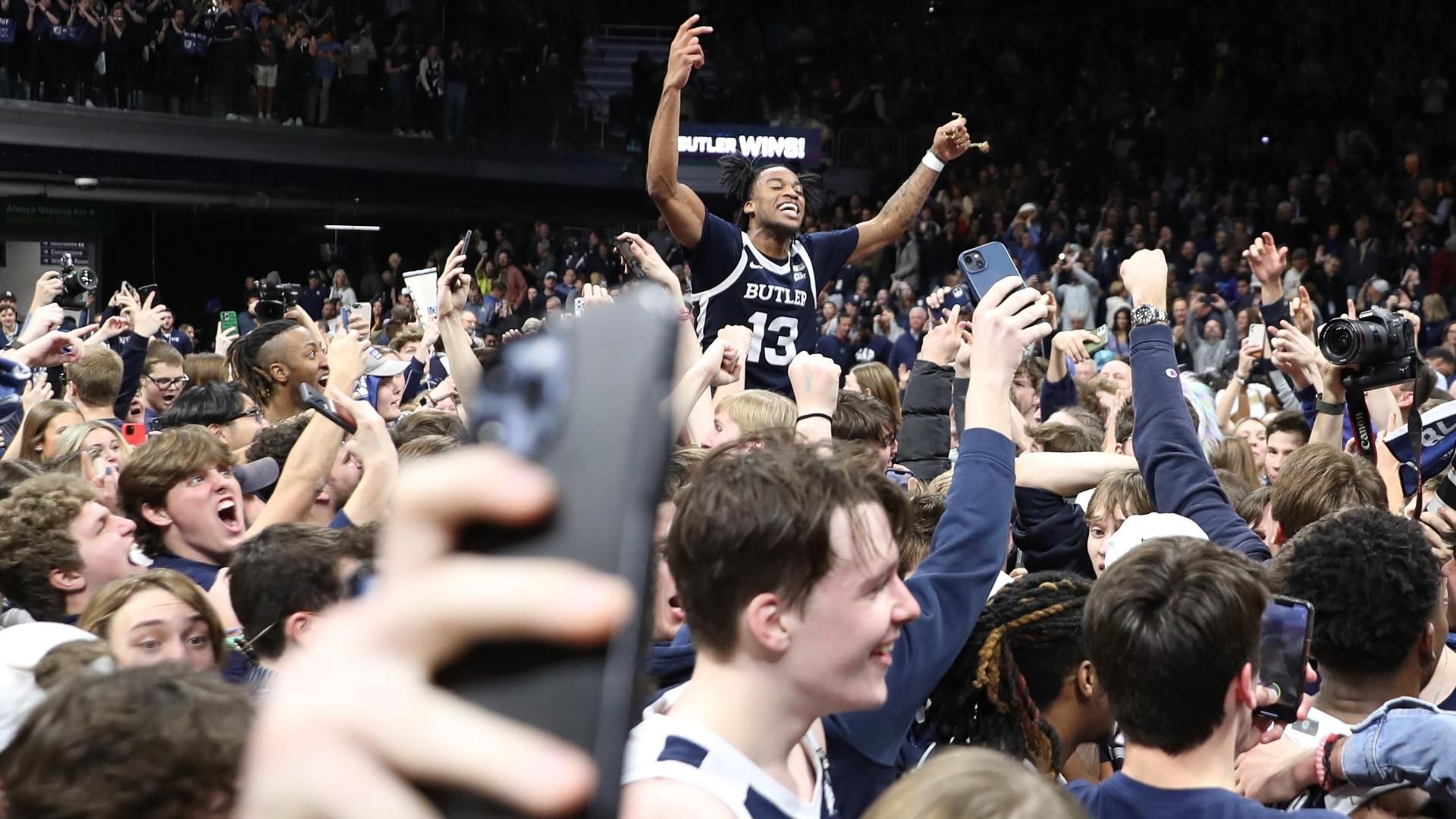 Butler fans storm court after wild finish vs. Xavier - ESPN Video