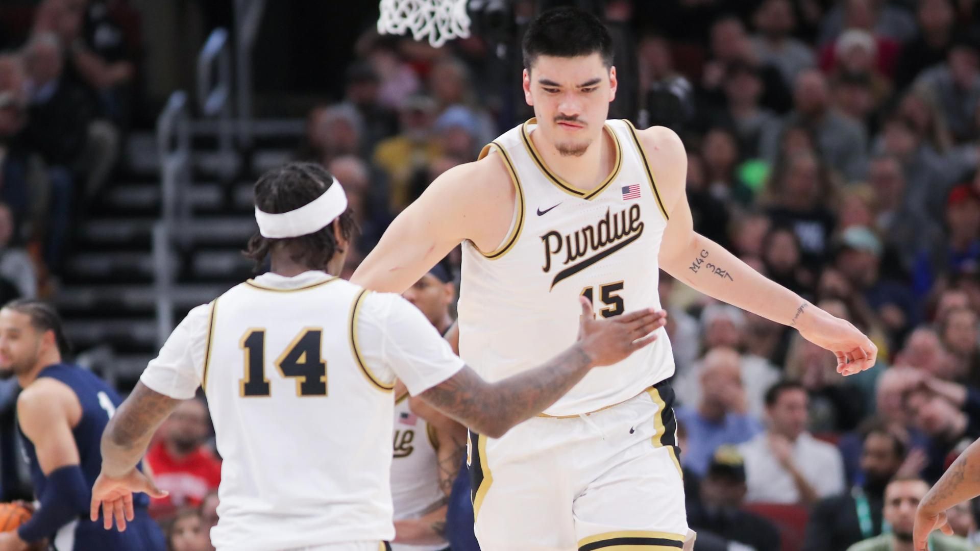 Zach Edey fights through triple team for a big Purdue bucket - ESPN Video