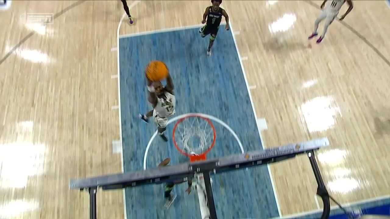 Ty Brewer swings from the rim after a mean two-handed slam dunk - ESPN ...