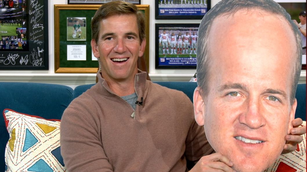 Eli shows off his life-sized Peyton head - ESPN Video