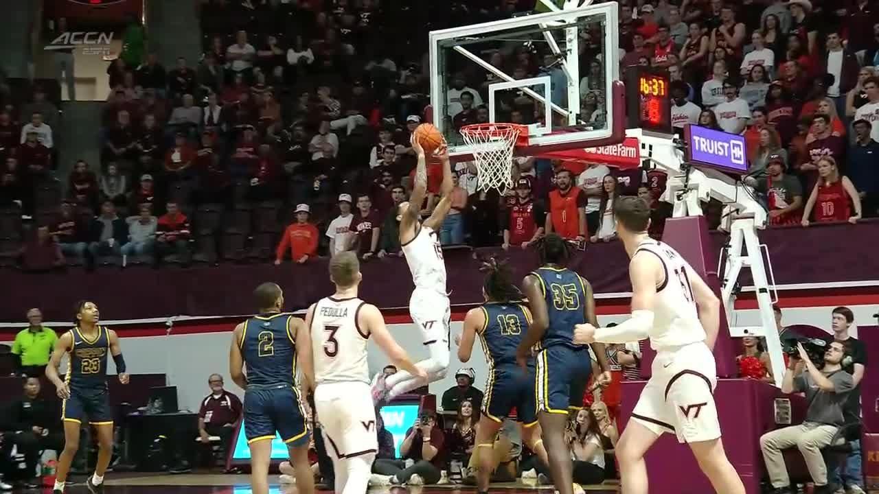 Lynn Kidd gets up for the beautiful slam - ESPN Video