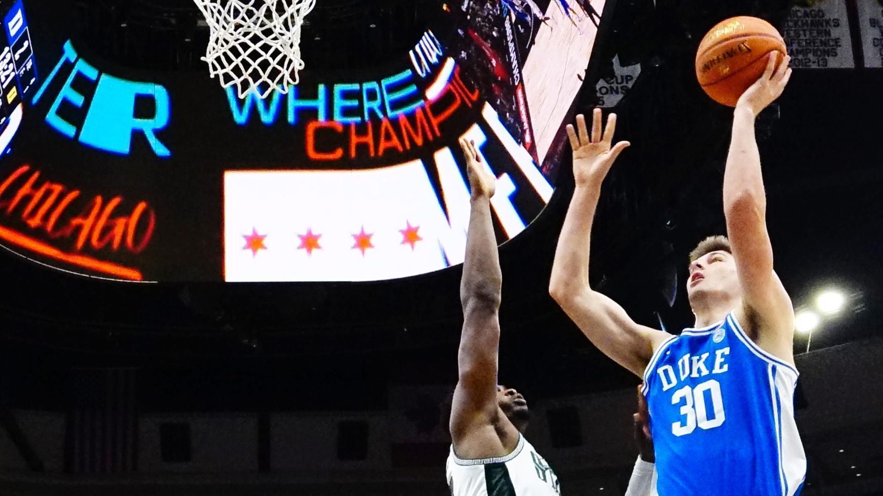 Kyle Filipowski spins to the rack for a Duke basket - ESPN Video