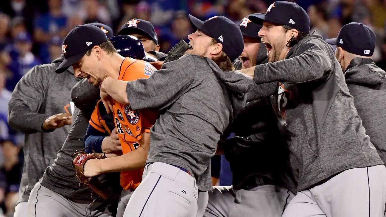 Astros start workouts with an unfamiliar ring -- as champions - ESPN