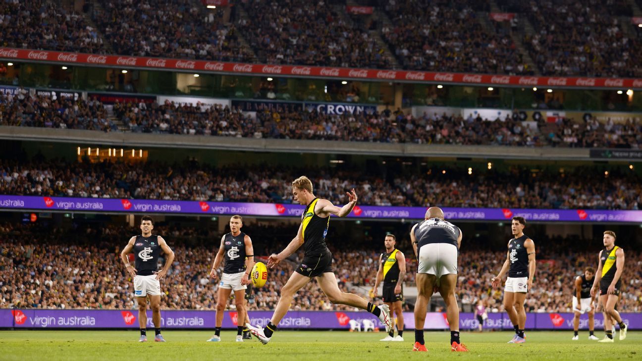 Lynch goal seals draw in Tigers-Blues AFL season opener - ESPN