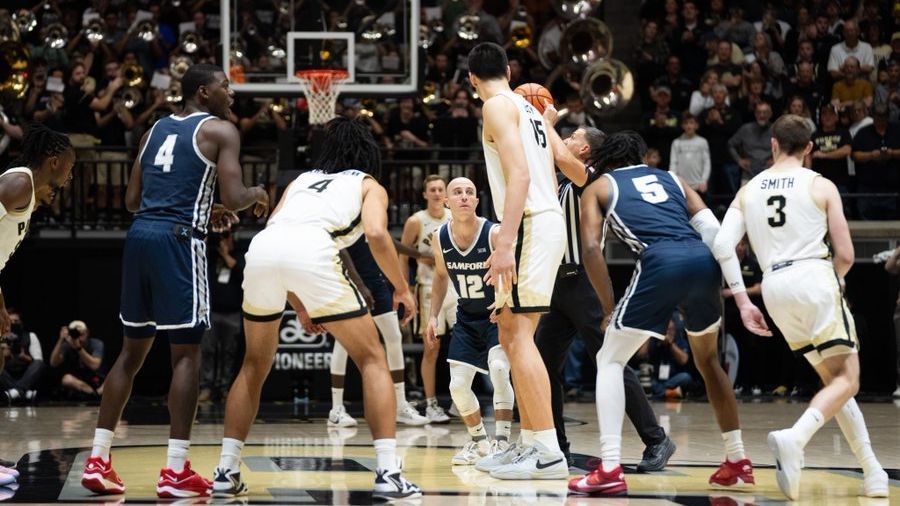 Zach Edey towers over 5-foot-8 Dallas Graziani for jump ball - ESPN