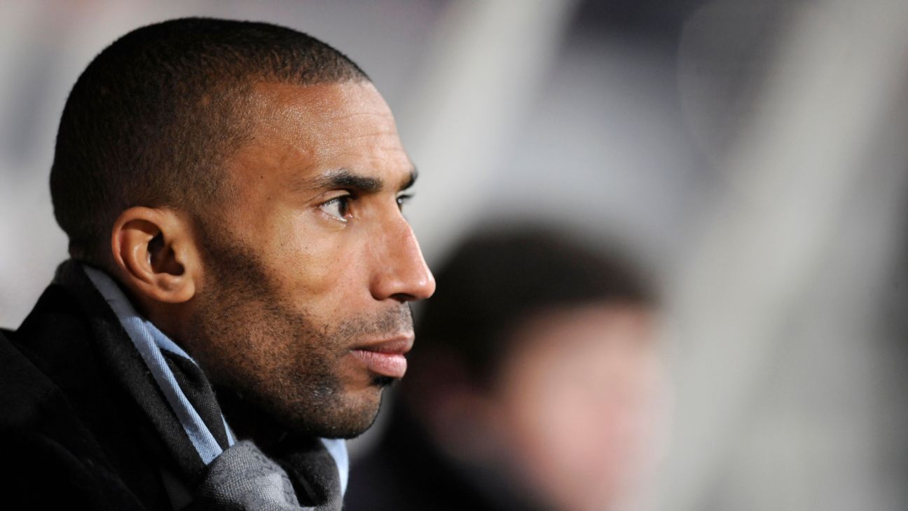 Orlando Pirates staff, including Abdesalam Ouaddou and defender Tapelo ...