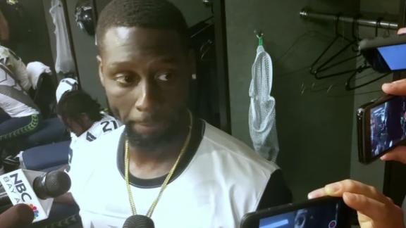 Jeremy Lane sits during national anthem ahead of Seahawks-Raiders ...