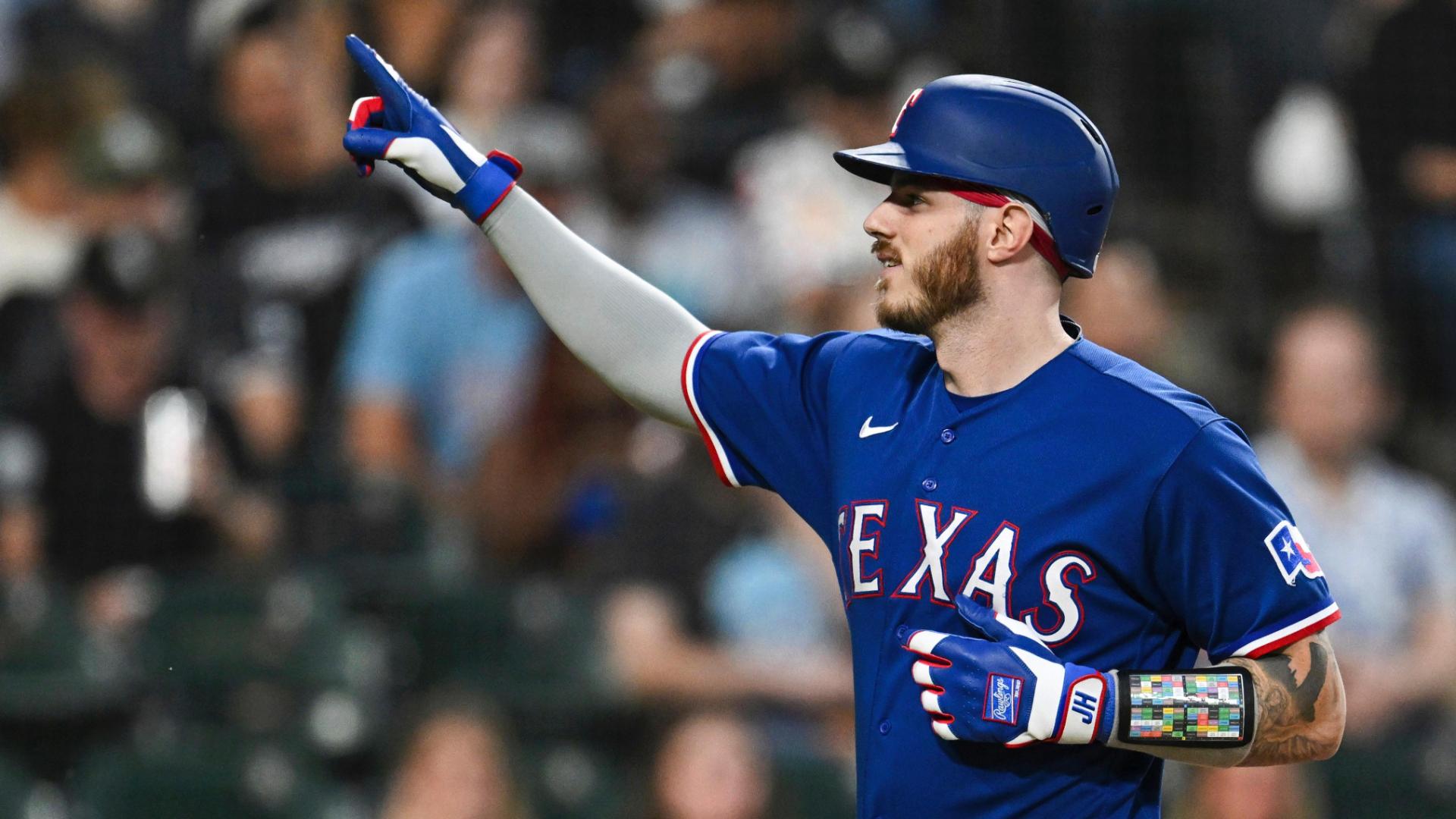 Heim homers a night after controversial play at the plate, the Rangers ...