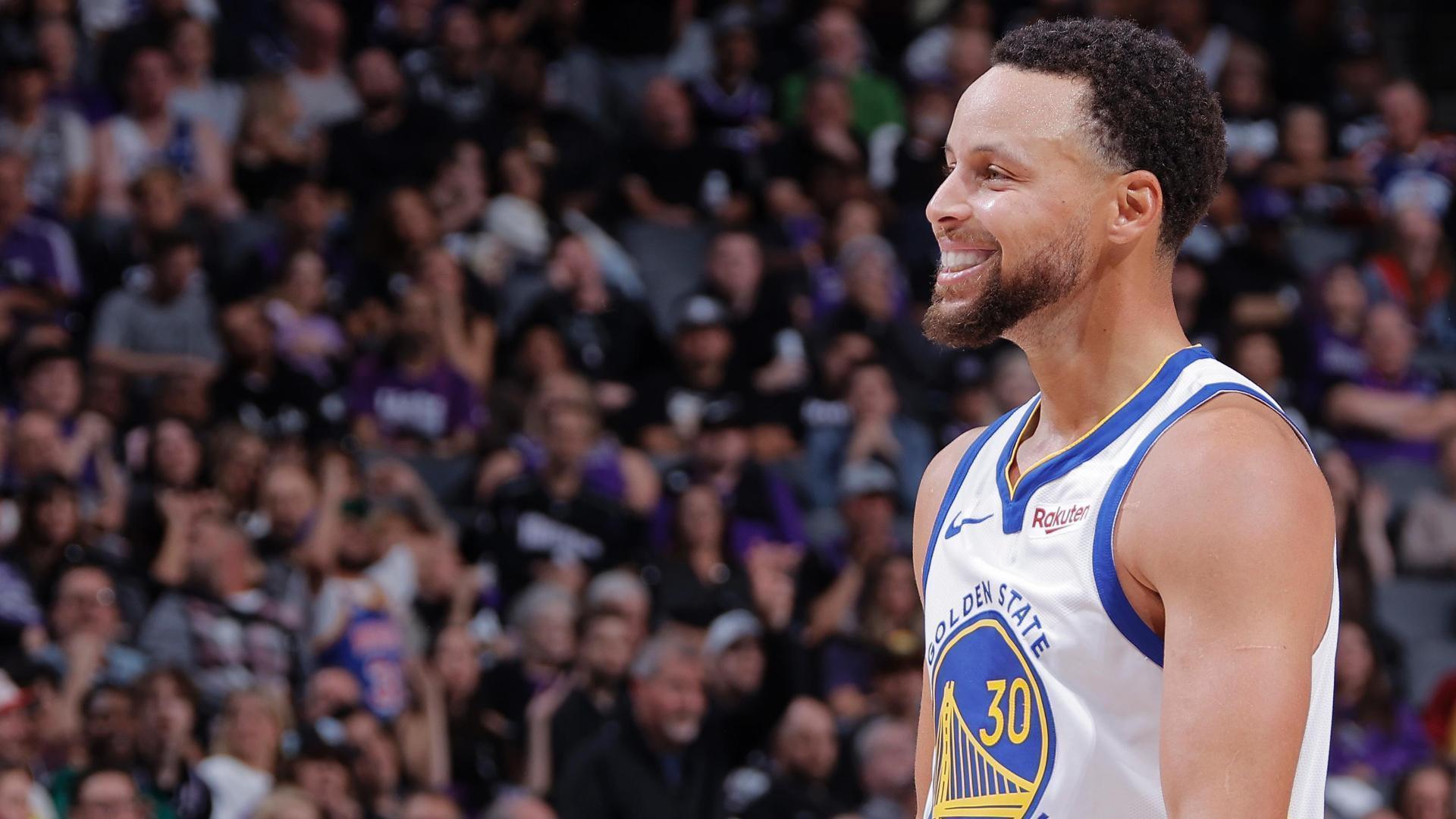 Curry scores 41 points to lead the Warriors past the Kings 122-114 in a ...