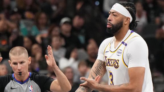 Anthony Davis, LeBron James lead Lakers past Spurs 120-115 to open NBA ...