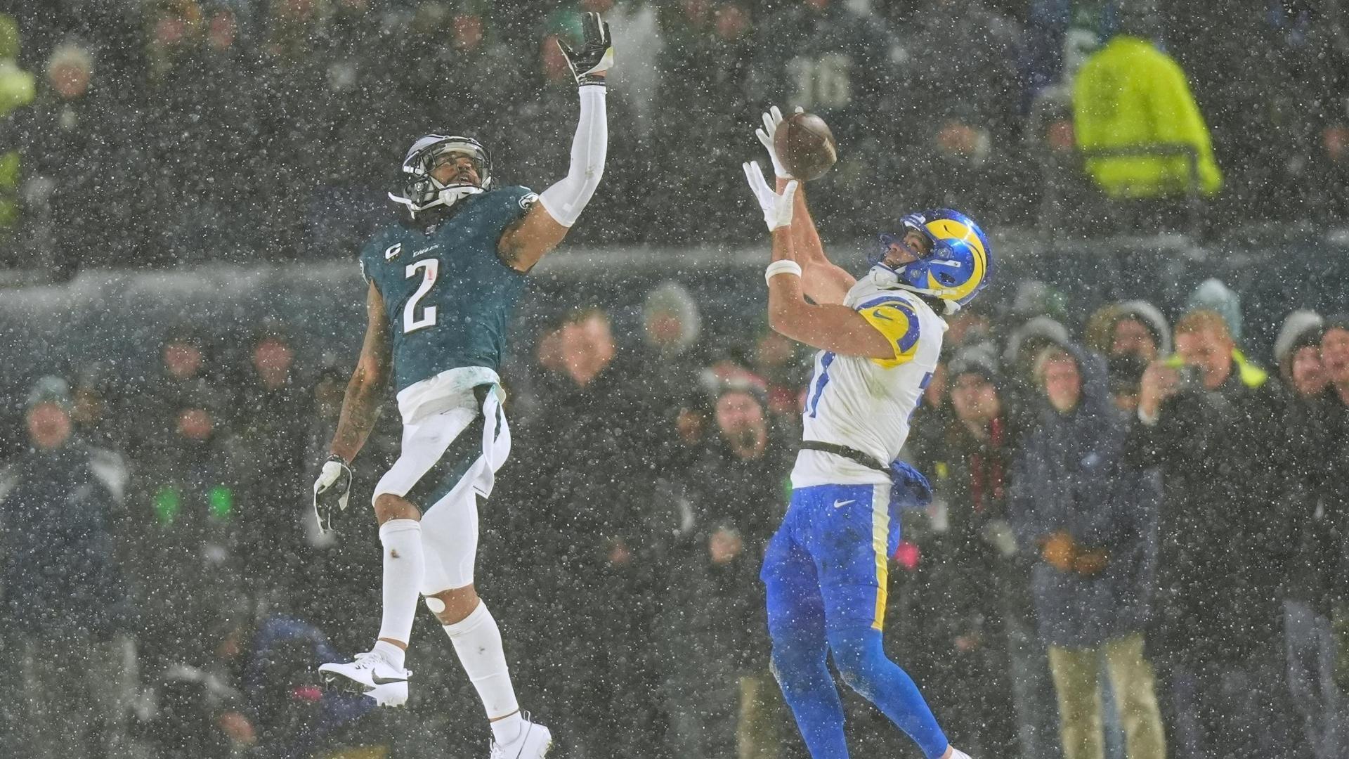 Barkley runs for 78- and 62-yard TDs in the snow and Eagles top Rams 28 ...