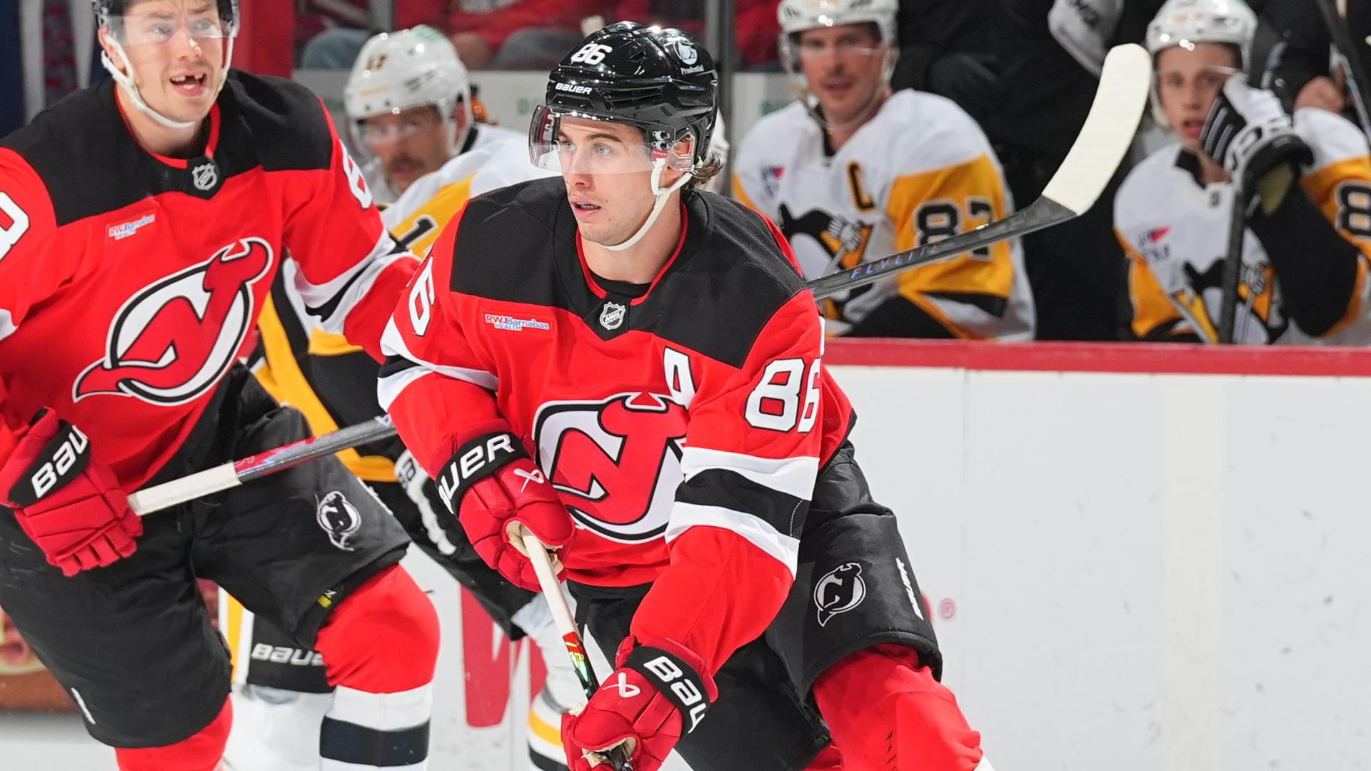 Devils beat the Penguins 2-1 in a shootout to take over 1st place in ...