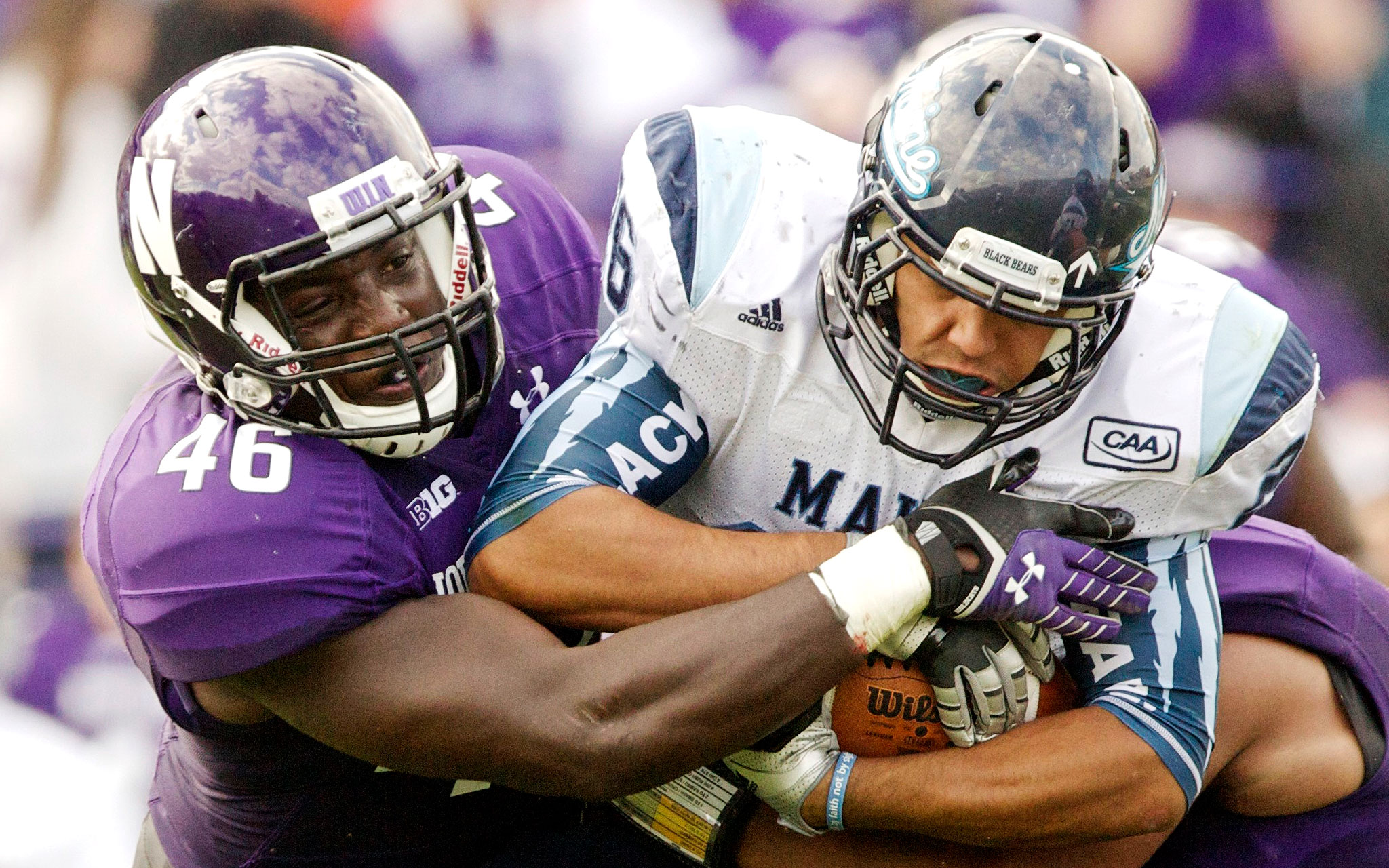 Purple Takedown - The Week in Pictures for Sept. 16-Sept. 22, 2013 - ESPN