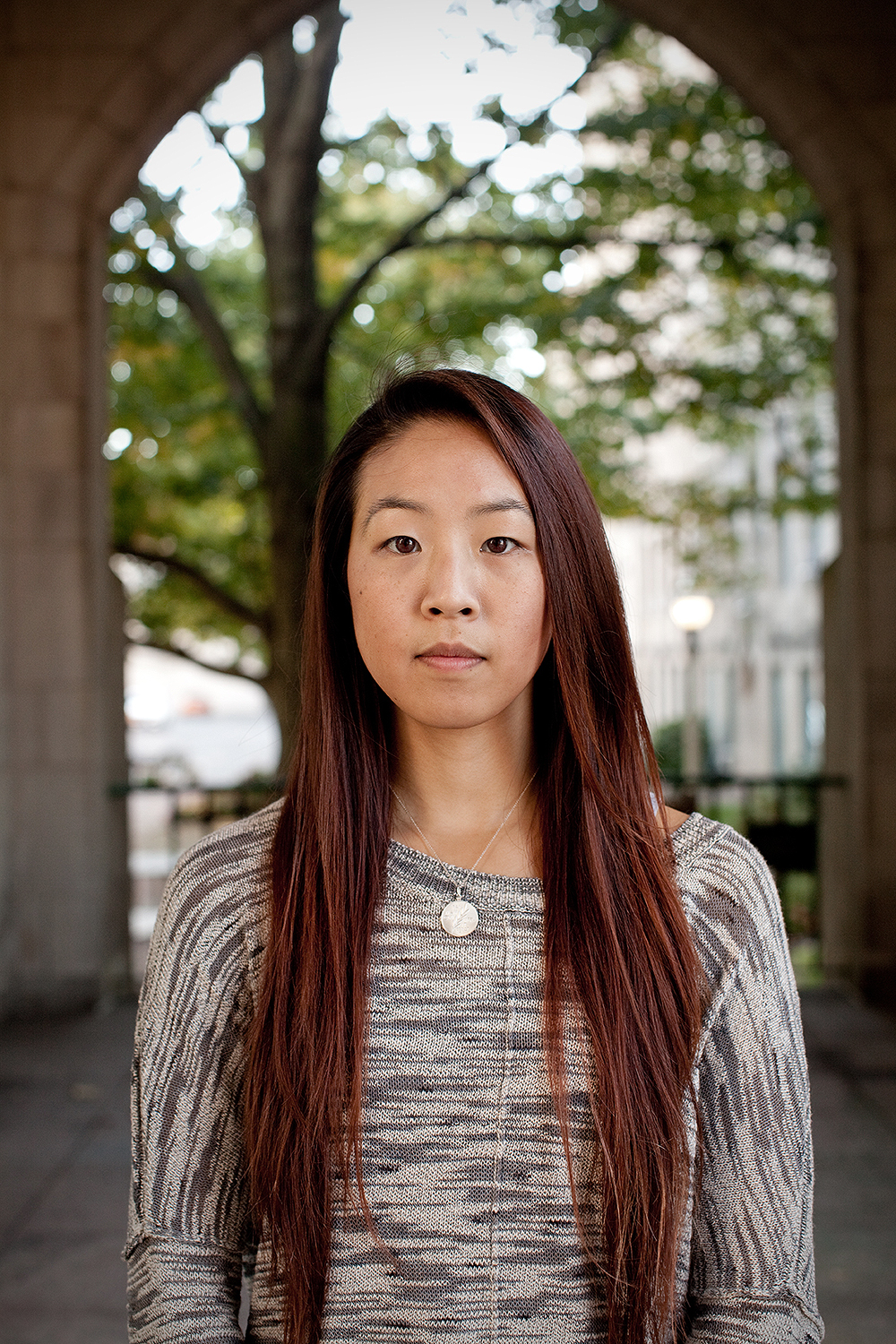 Devin Wang poses in archway - ESPN