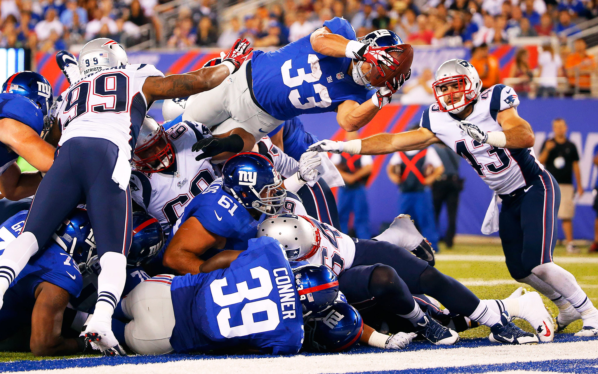 Peyton Hillis - The Week in Pictures: Aug. 25-Sept. 1, 2014 - ESPN