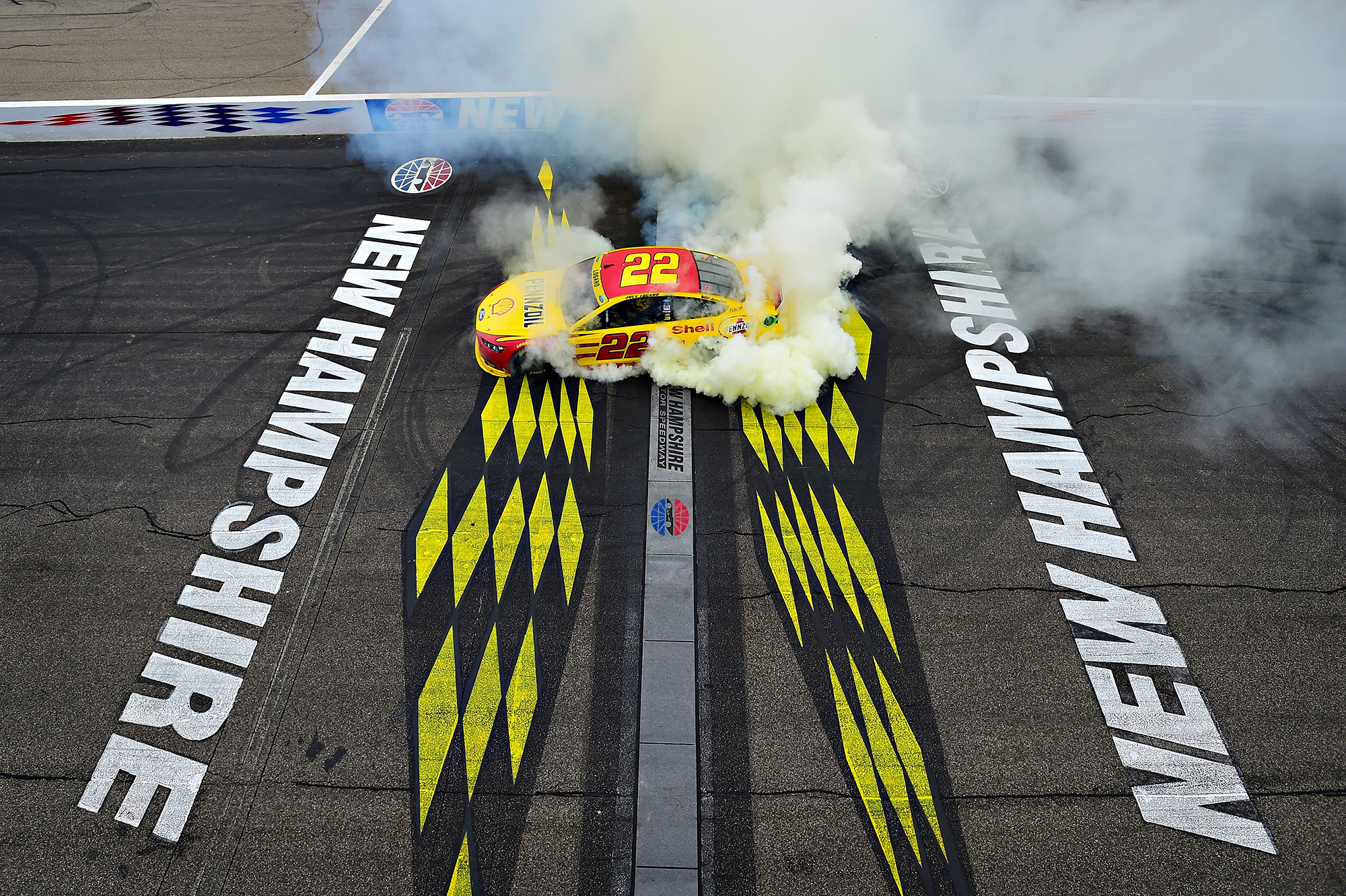 Joey Logano - The Week in Pictures: Sept. 15-21, 2014 - ESPN