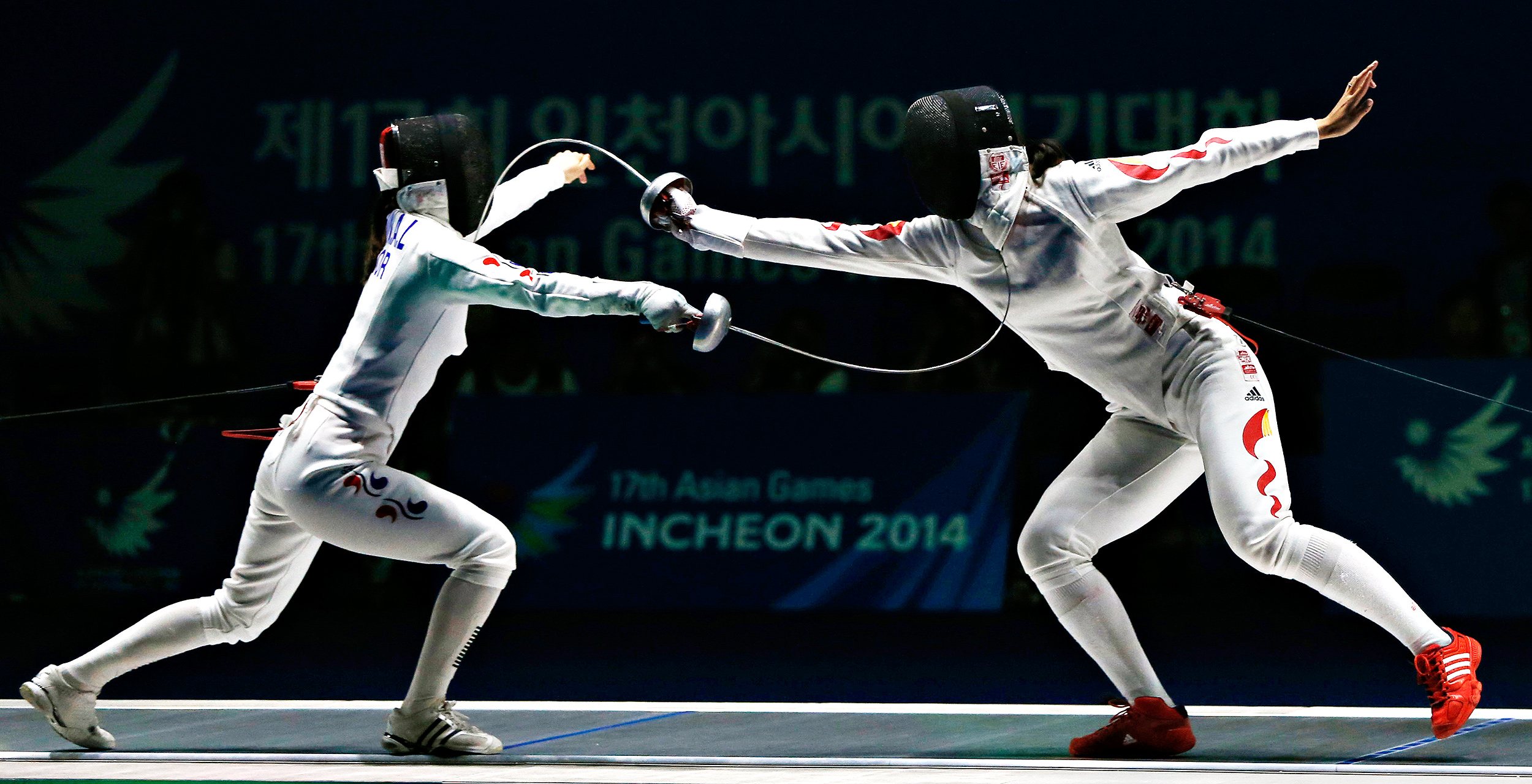 Fencing - The Week in Pictures: Sept. 22-28, 2014 - ESPN