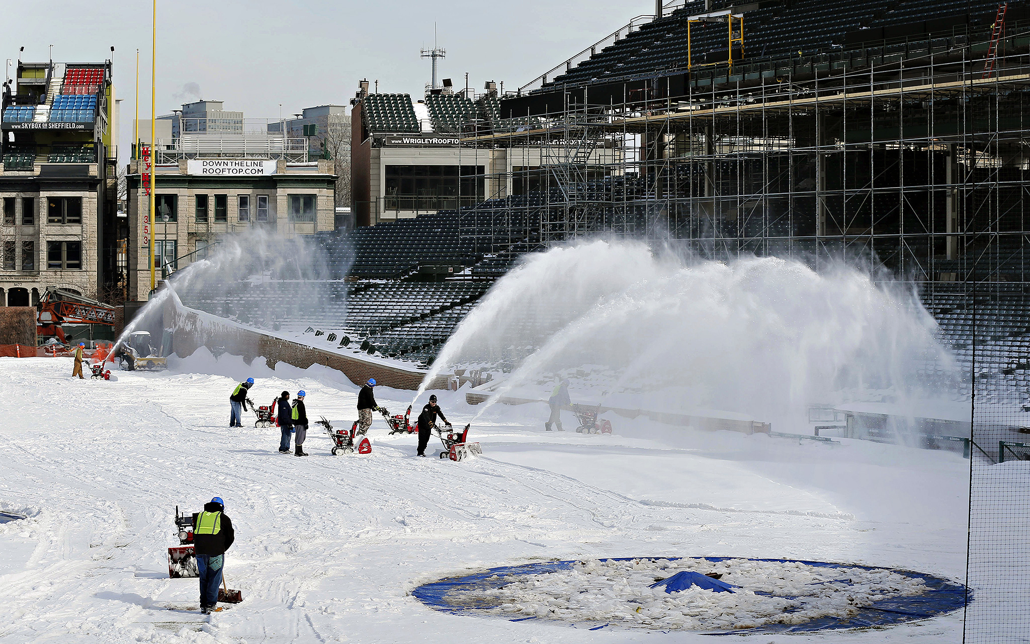 Snowed out at Wrigley Field - The Week in Pictures: March 2 - March 9 ...