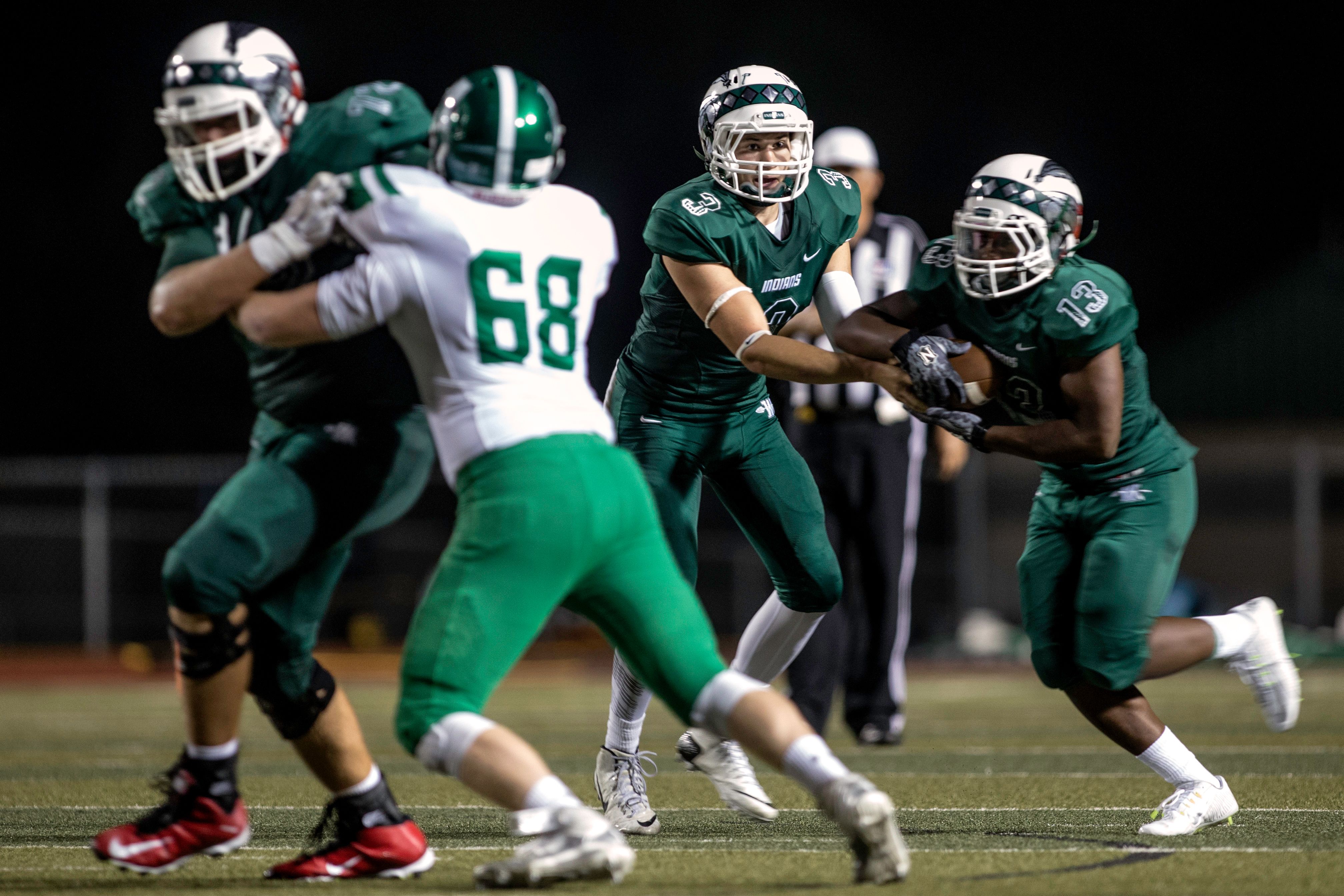 Jordan Kitna hands it off - Photos: Jon Kitna, Head Football Coach at ...