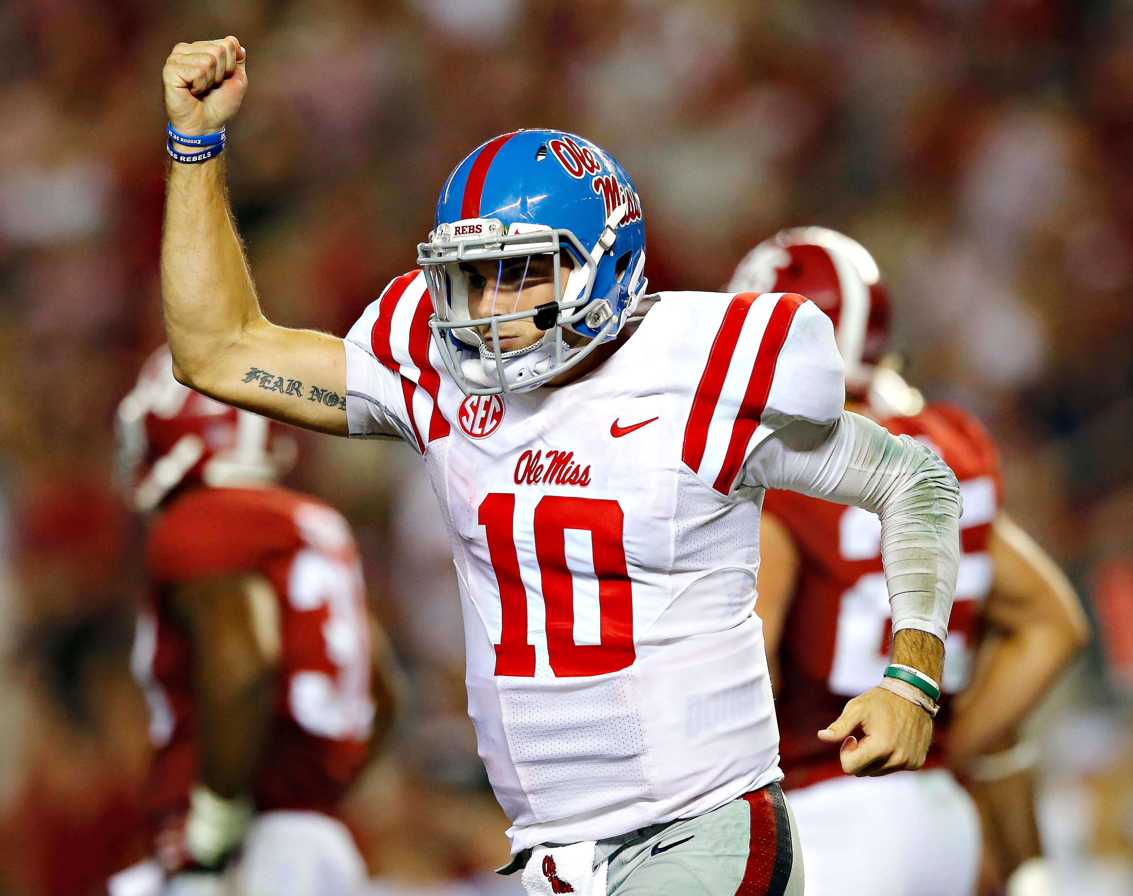 Chad Kelly ups the score - Top Photos of the Four Matchups in Week 3 of ...