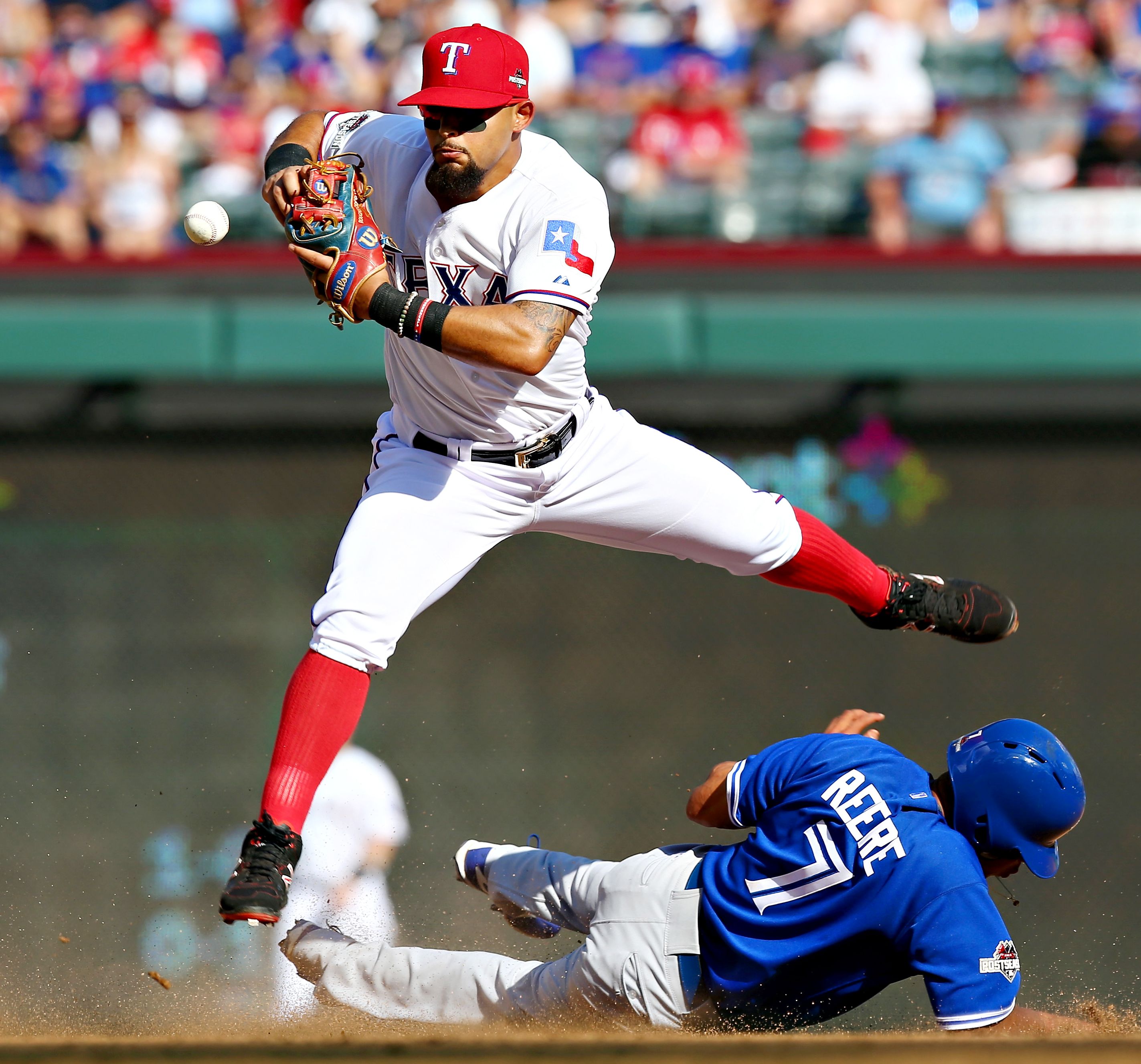 Dropping the ball - Photos: Rangers vs. Blue Jays in the ALDS - ESPN