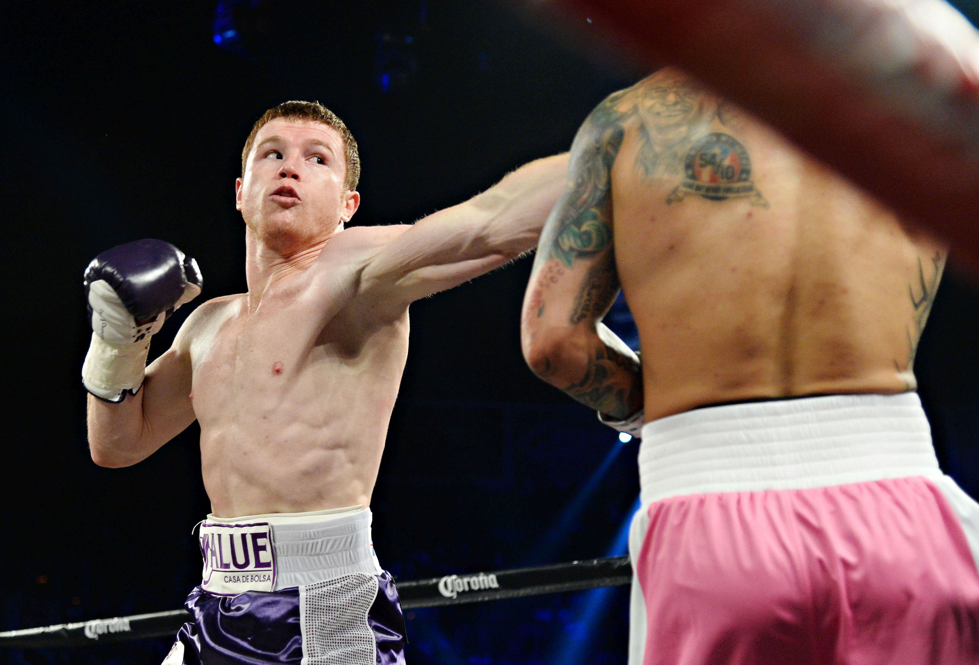 Out in front - Photos: Miguel Cotto vs. Canelo Alvarez - ESPN