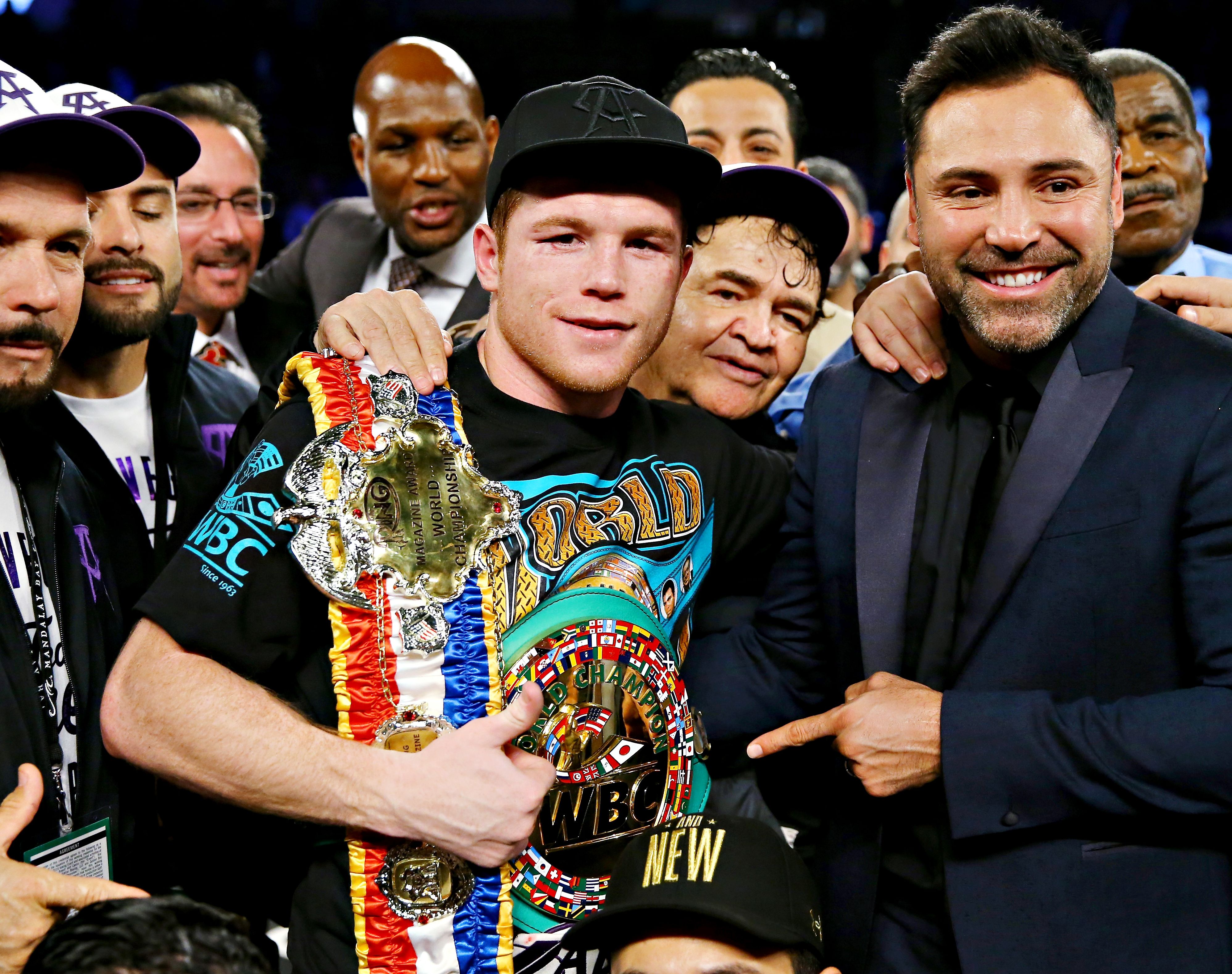 Celebration time - Photos: Miguel Cotto vs. Canelo Alvarez - ESPN