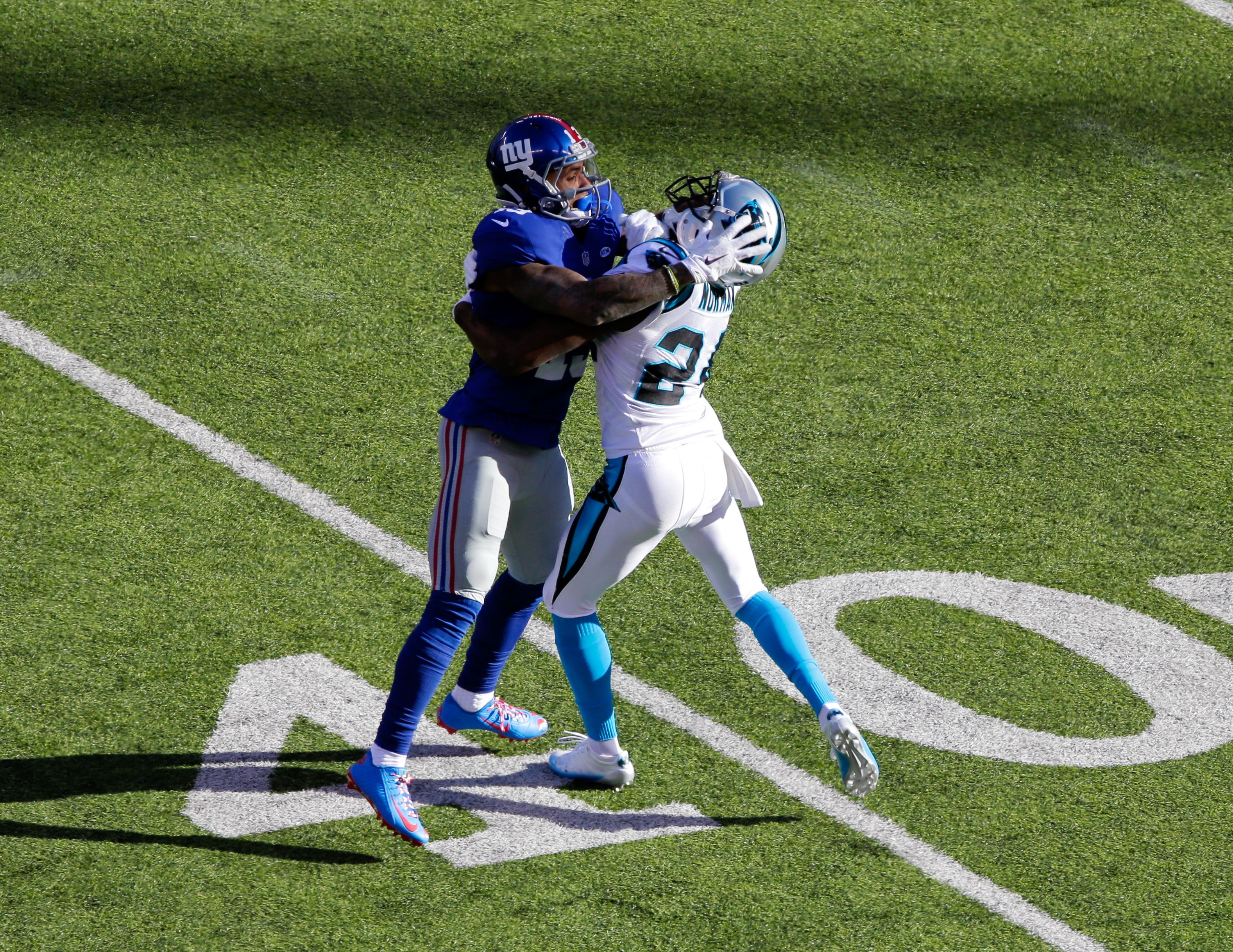 Odell Beckham Jr. and Josh Norman - Photos: Odell Beckham Jr. vs. Josh ...
