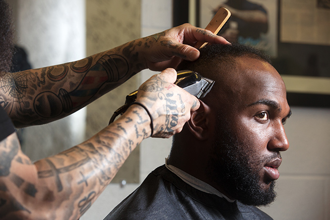 Miami Headz Up barber Hugo Juice Tandron styles the Marlins