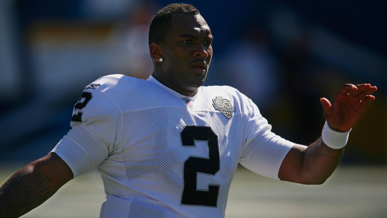 Former No. 1 pick JaMarcus Russell fired as coach, faces lawsuit ...