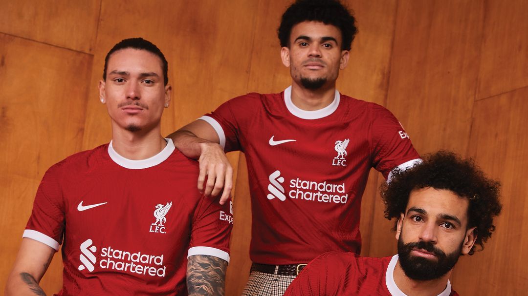 Liverpool stars don flares and go back to the ’70s to unveil new home ...