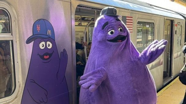 Grimace arrives for Mets' NLDS game on custom 7 train - ABC7 New York